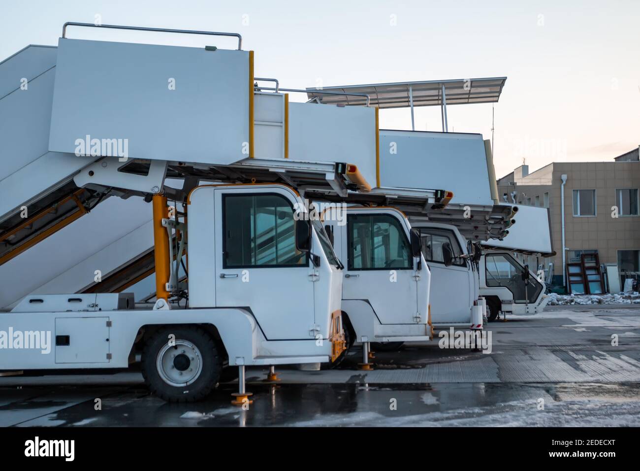 Close-up of row aircraft mobile gangway for boarding and disembarking ...