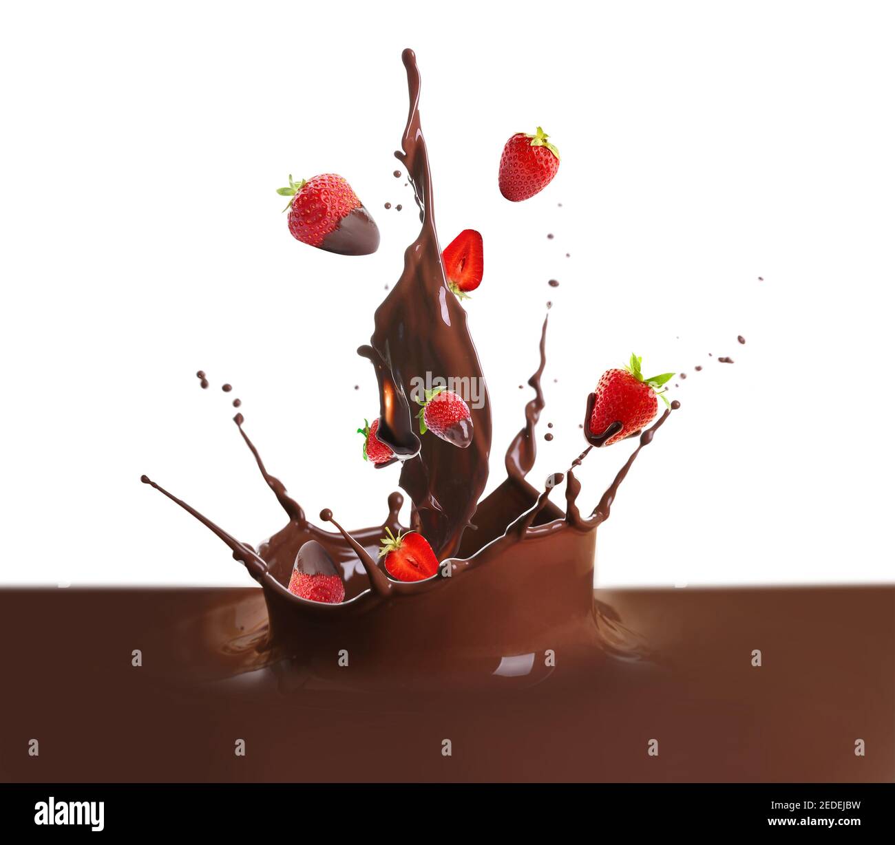 Sweet falling strawberry and splash of hot chocolate on white ...