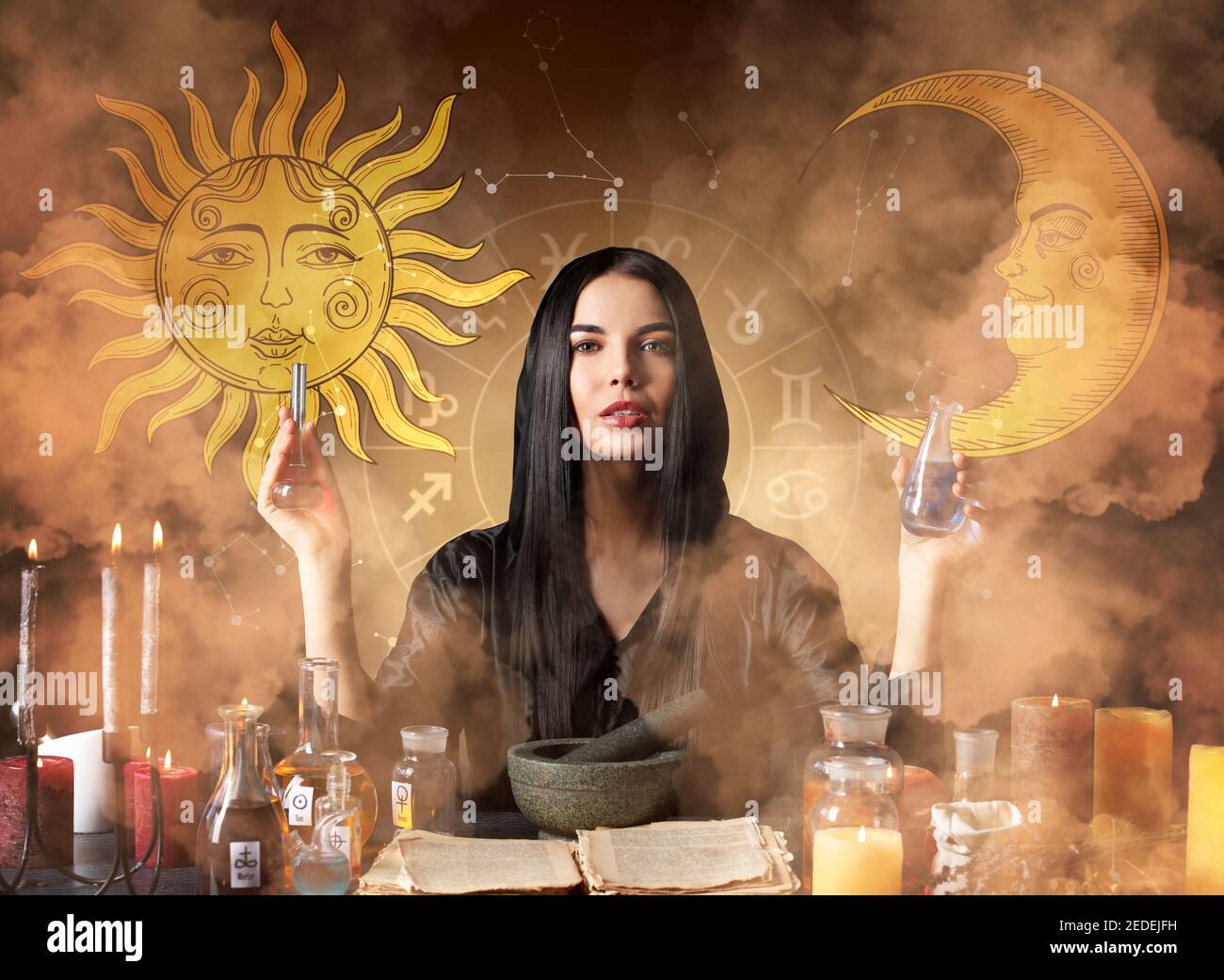 Female alchemist making potion on dark background Stock Photo - Alamy