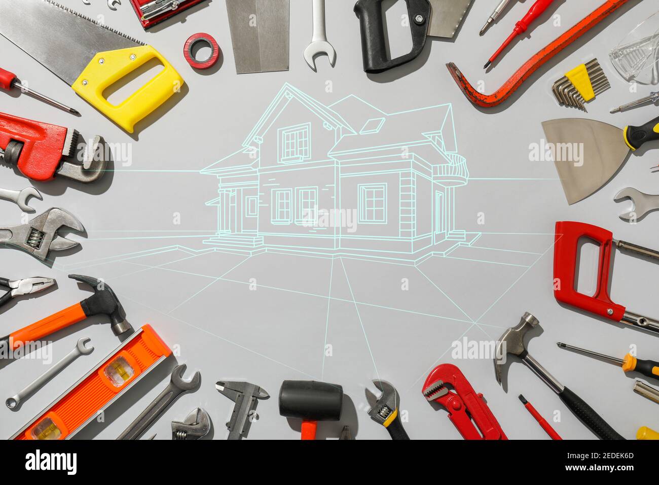 Set of different construction tools and building drawing on grey ...