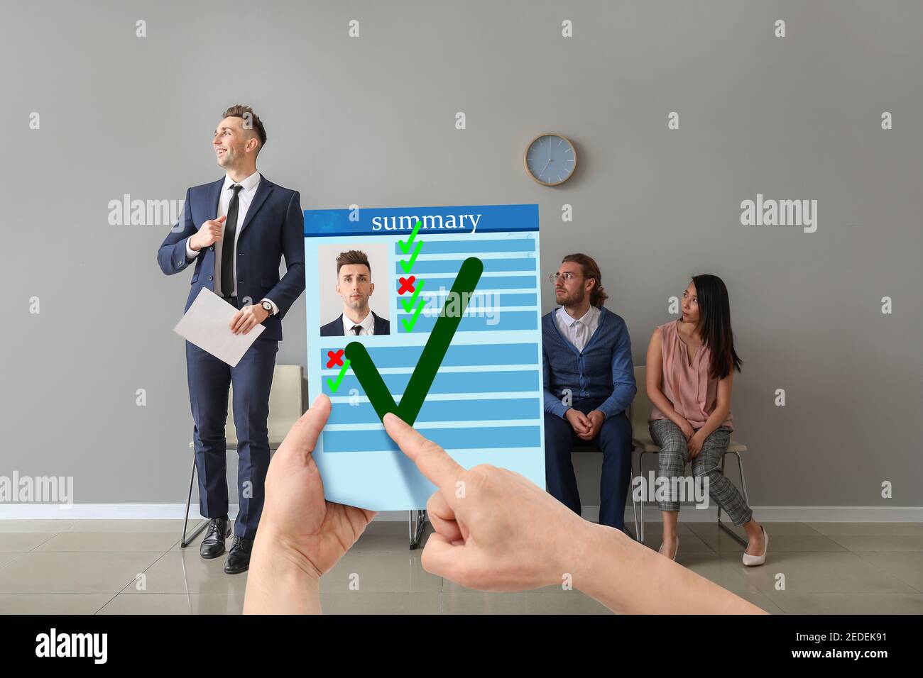 Human resources manager screening male employee in office Stock Photo ...