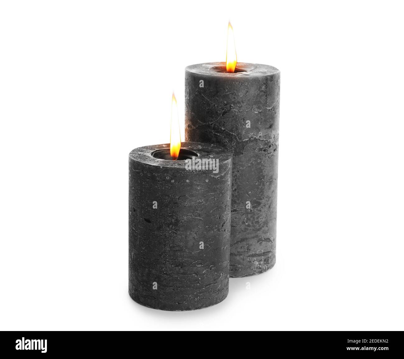 Glowing wax candles on white background Stock Photo - Alamy