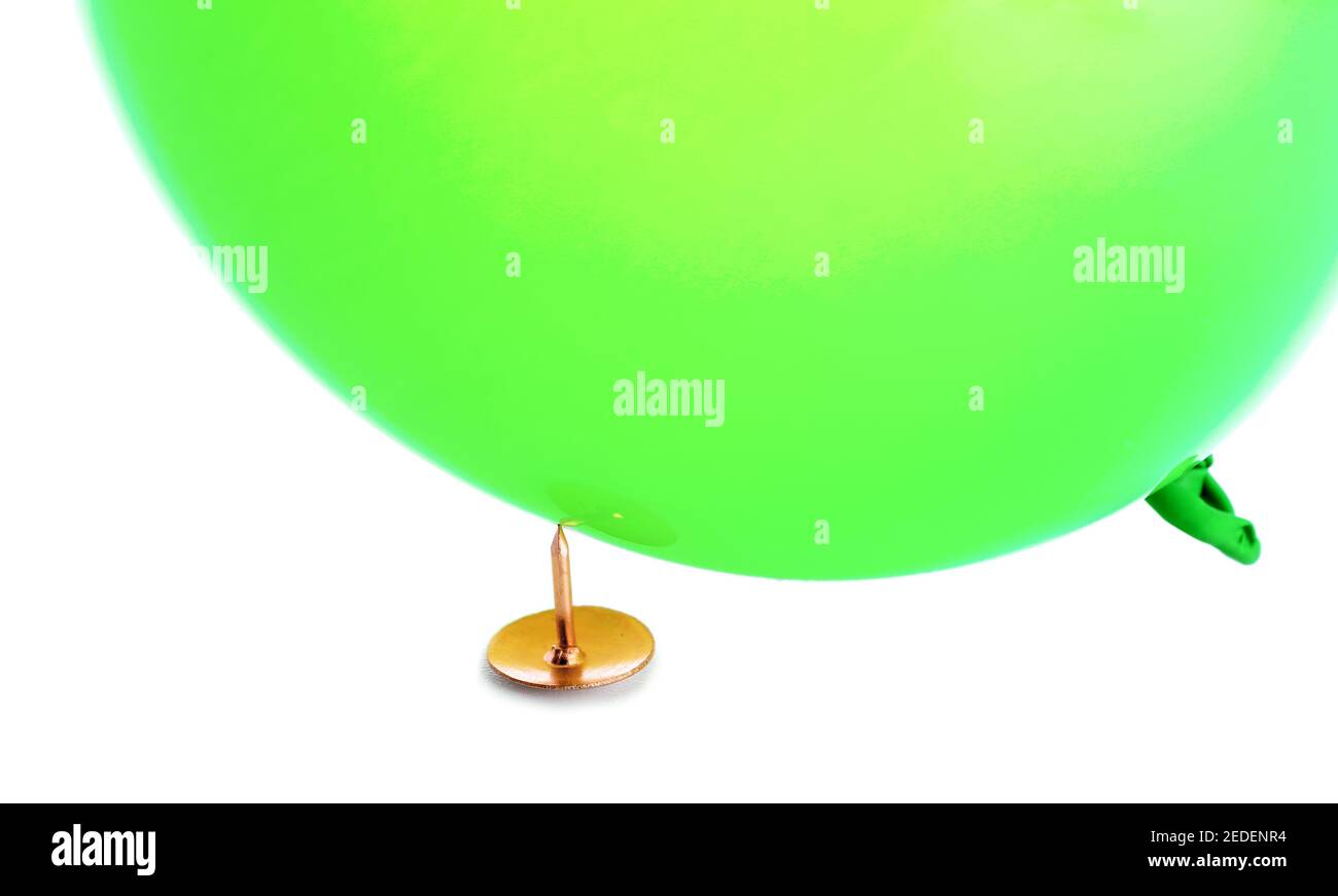 Office pin and air balloon on white background Stock Photo - Alamy