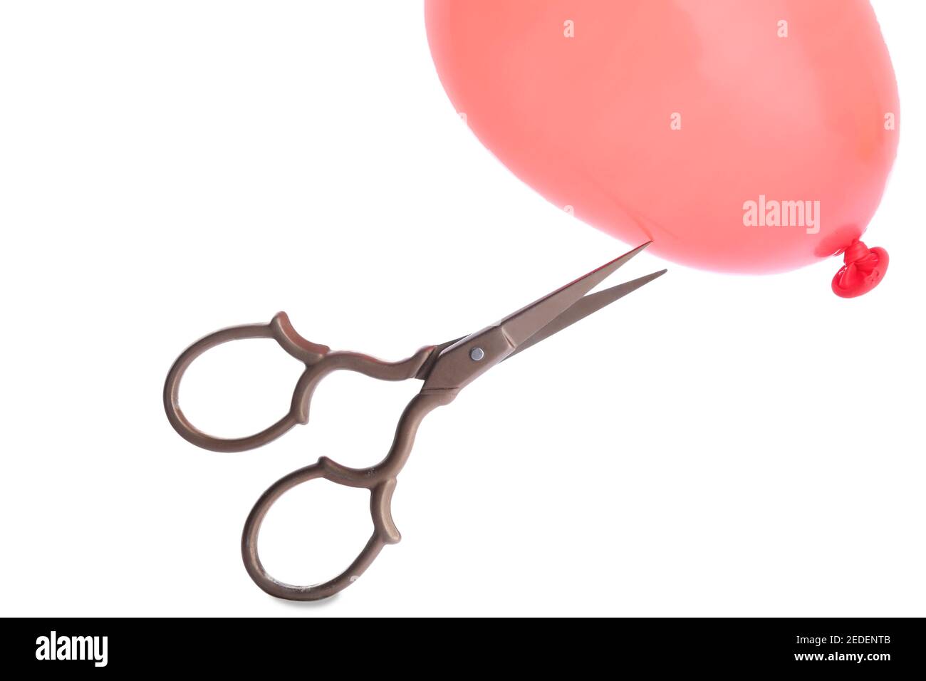 Scissors and air balloon on white background Stock Photo - Alamy
