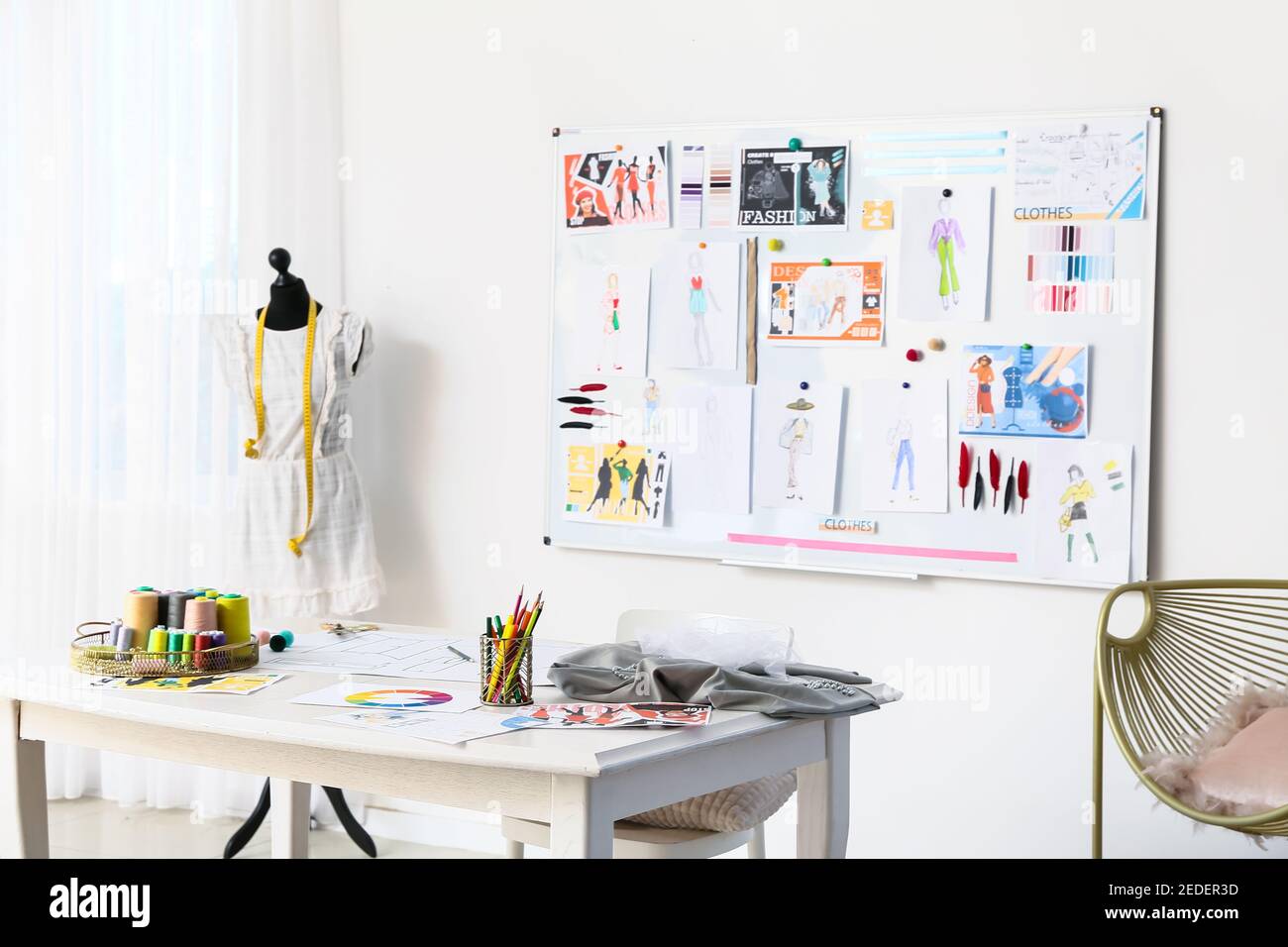 Interior of modern fashion designer workplace Stock Photo - Alamy