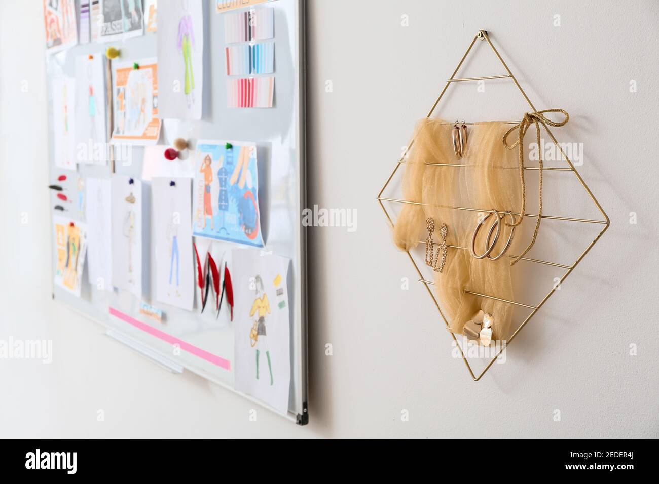 Fashion sketches in modern atelier Stock Photo - Alamy