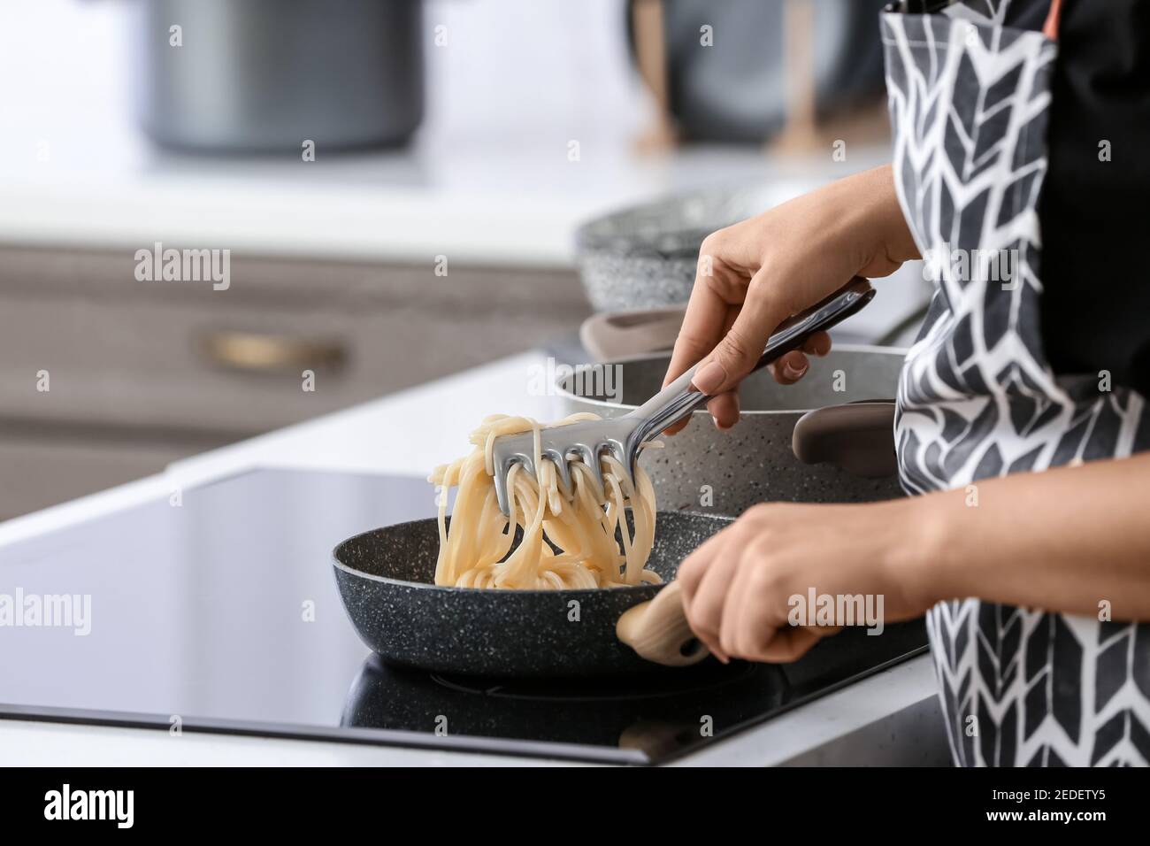 Cooking tasty pasta in hi-res stock photography and images - Alamy