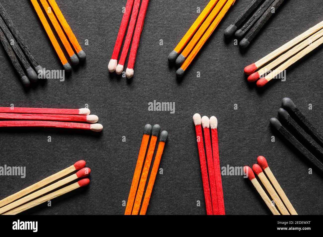 Different matches on dark background Stock Photo - Alamy
