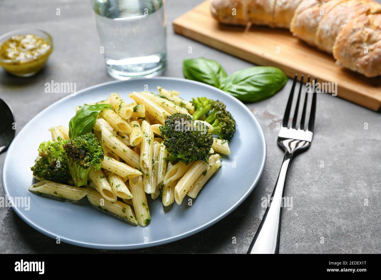 Delicious pasta with broccoli on dark background Stock Photo - Alamy