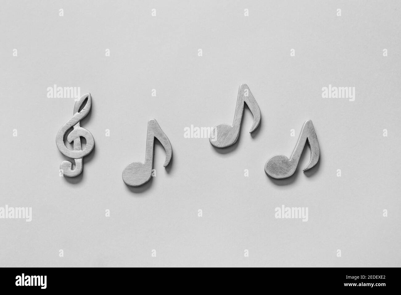 Music notes on light background Stock Photo - Alamy