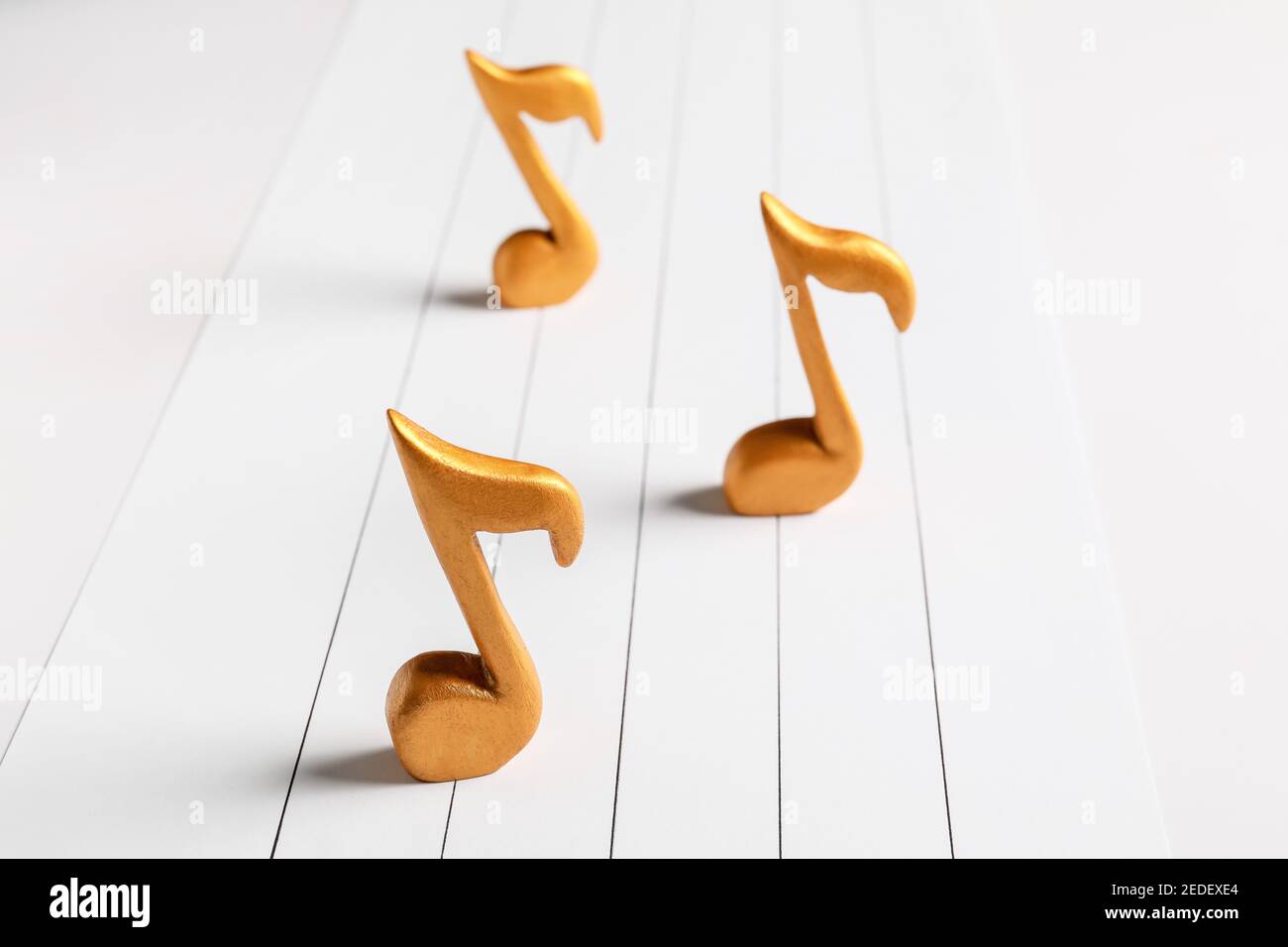 Music notes on light background Stock Photo - Alamy