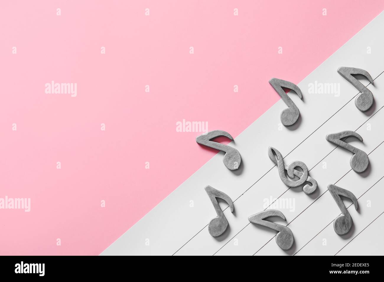 Music notes on color background Stock Photo - Alamy
