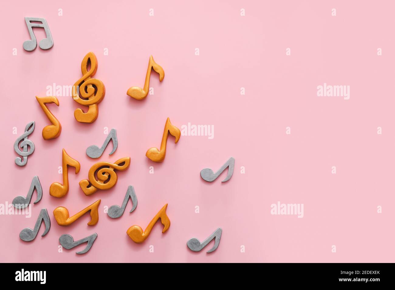 Music notes on color background Stock Photo - Alamy