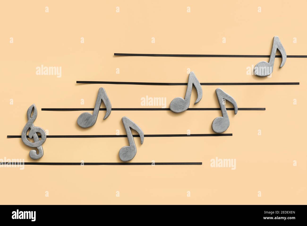 Music notes on color background Stock Photo - Alamy