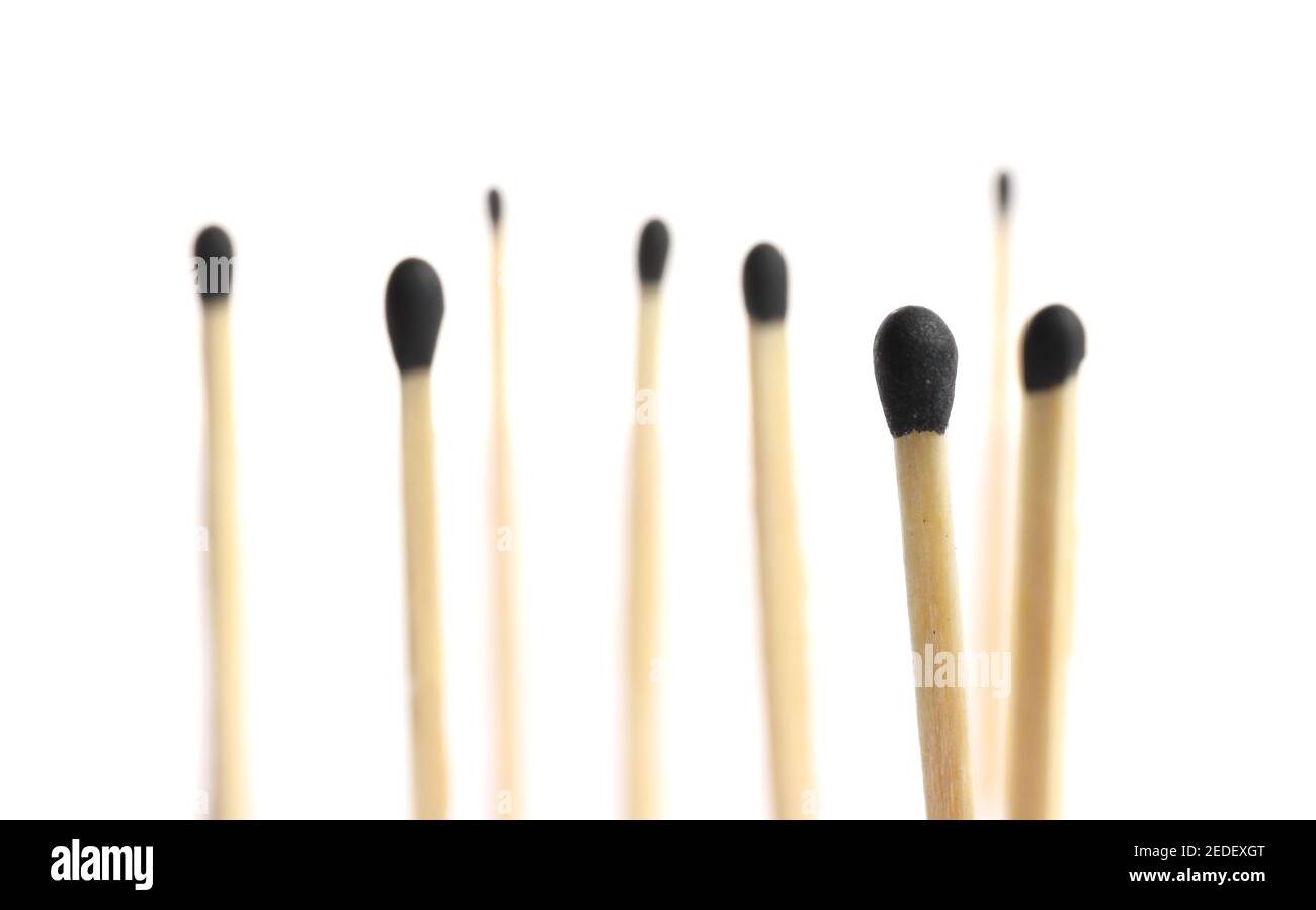 Many matches on white background Stock Photo - Alamy