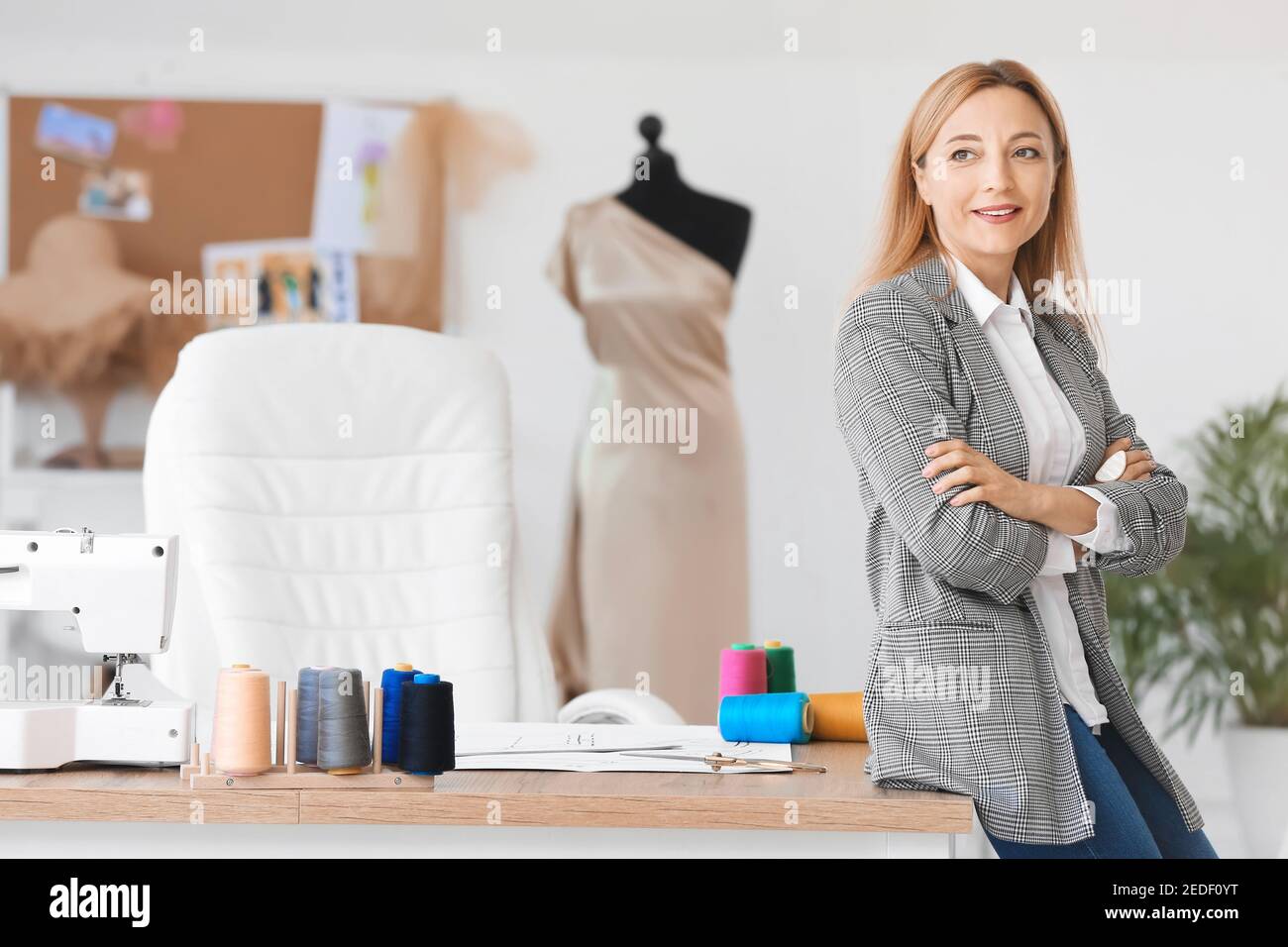 Female fashion designer in studio Stock Photo - Alamy
