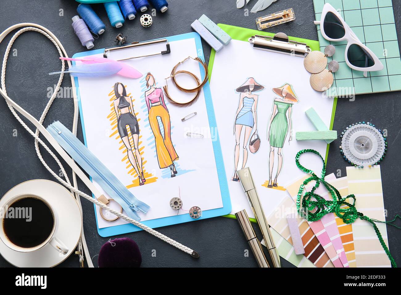 Fashion designer workplace with sketches on dark background Stock Photo ...