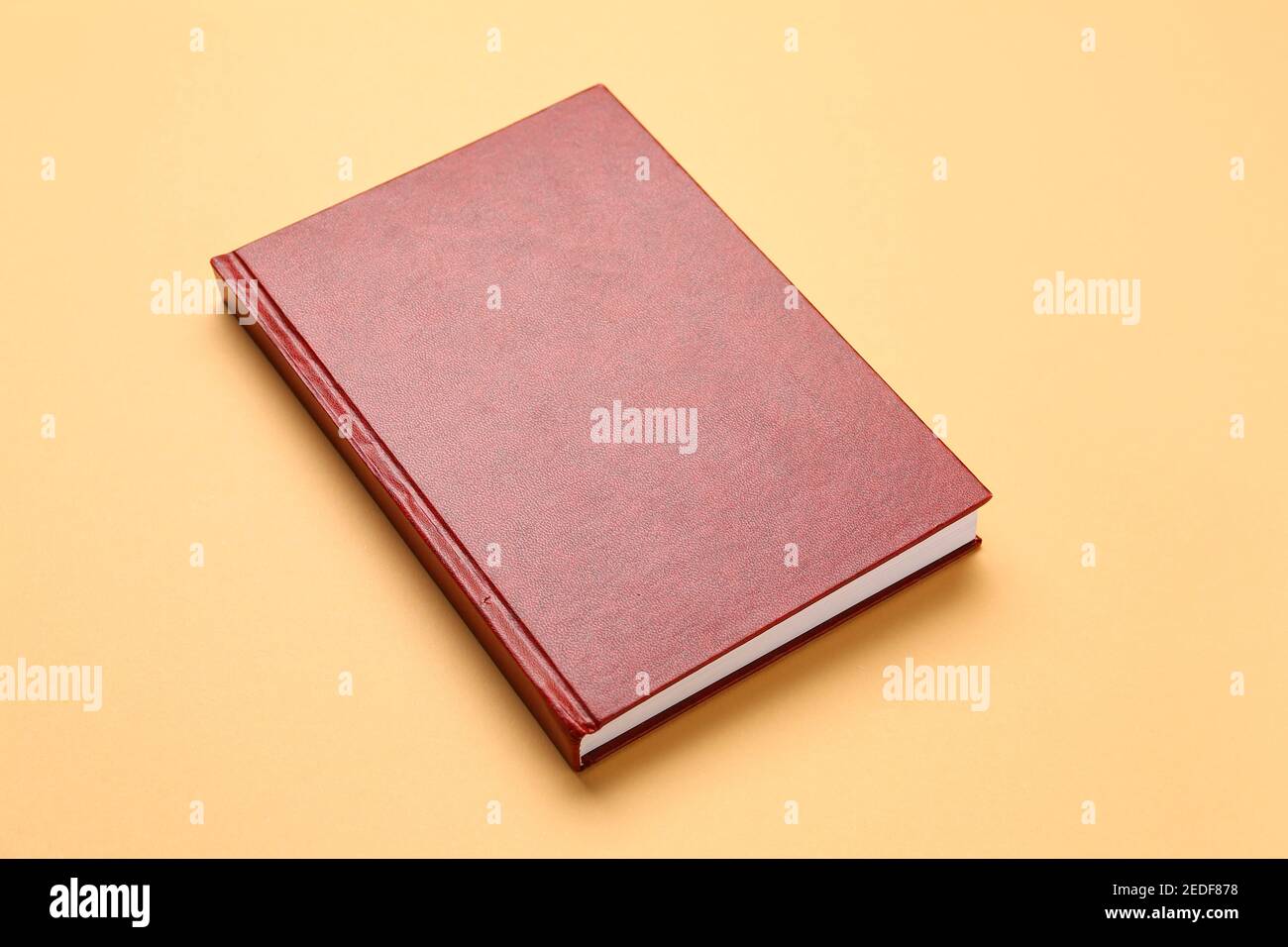 Blank book on color background Stock Photo - Alamy