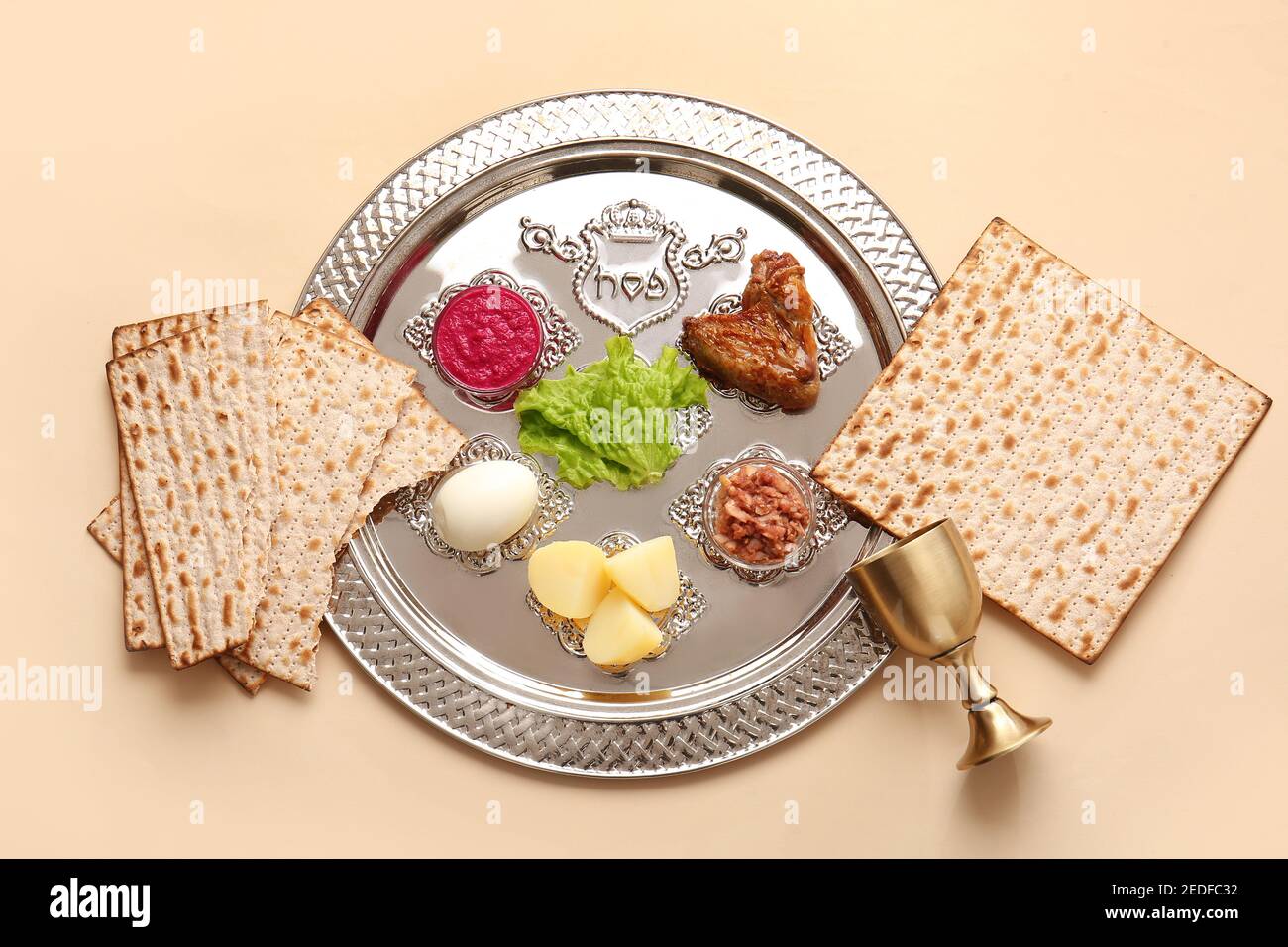 Passover Seder plate with traditional food on color background Stock ...
