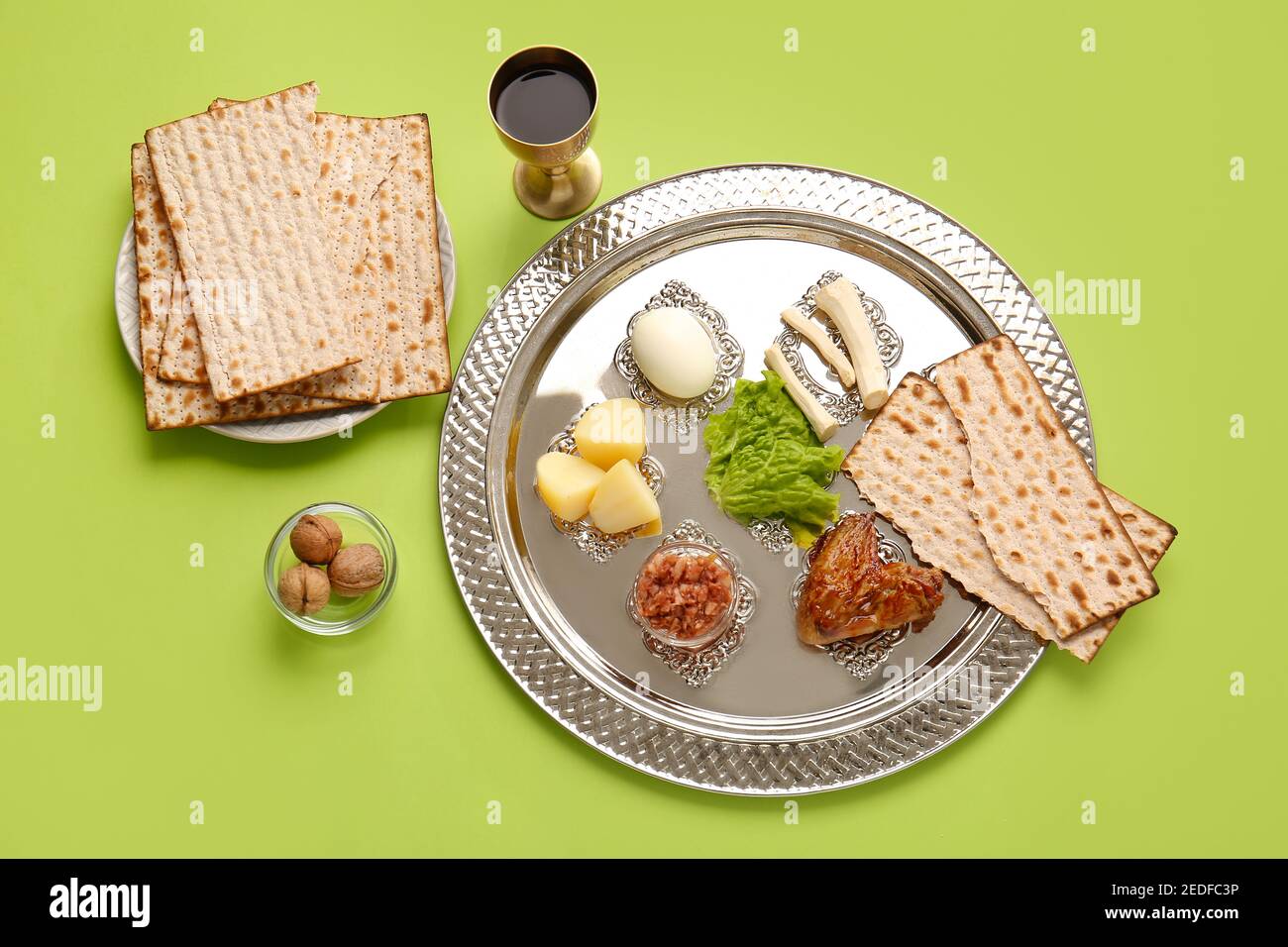 Passover Seder plate with traditional food on color background Stock ...
