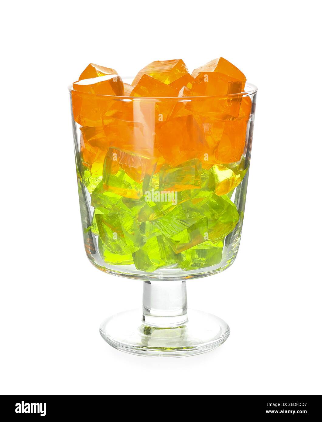 Glass with tasty jelly cubes on white background Stock Photo - Alamy