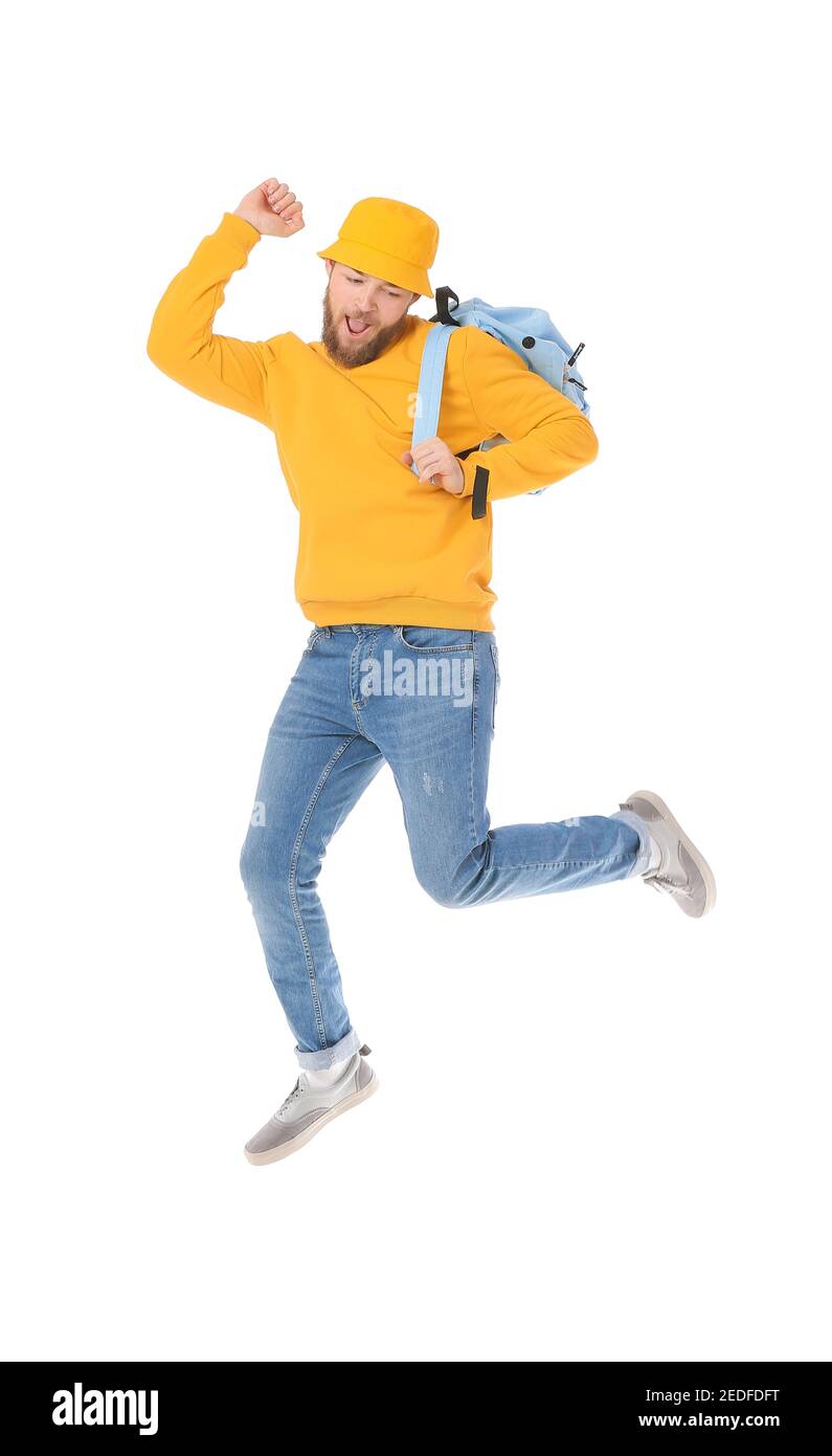 Jumping male student on white background Stock Photo - Alamy