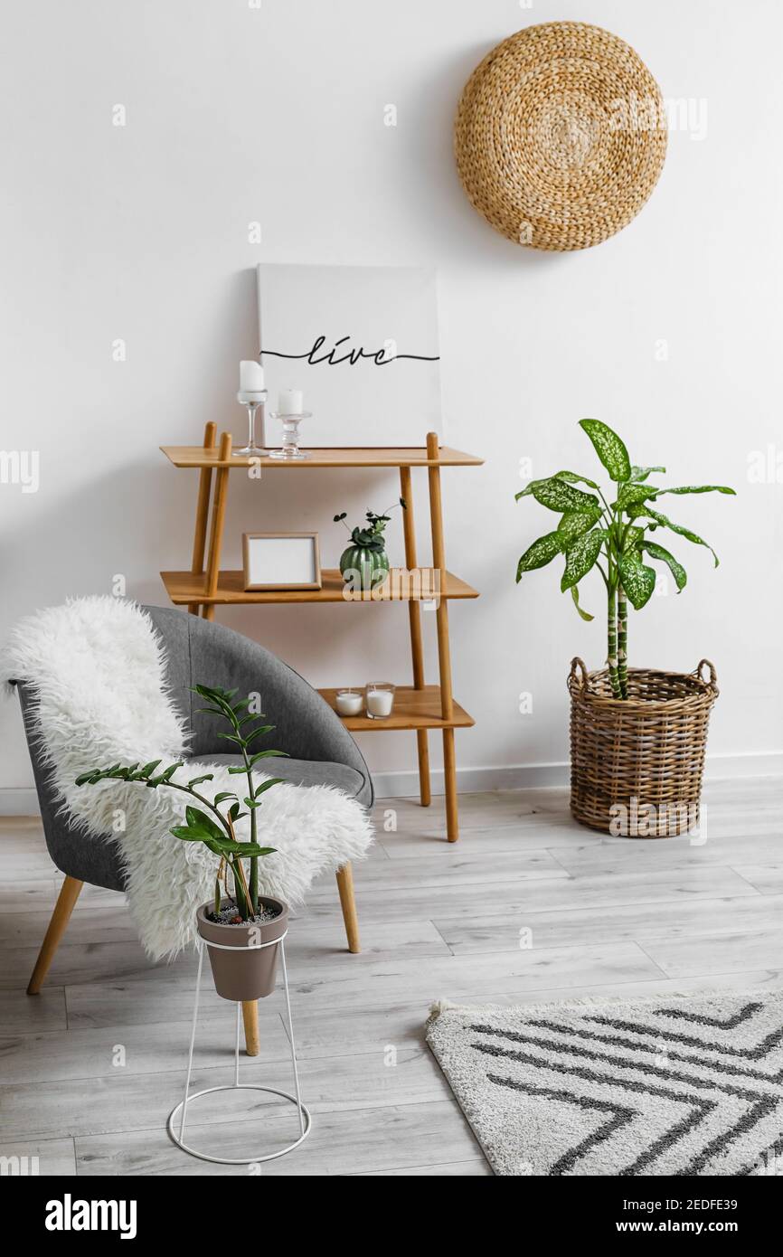Interior of living room with armchair Stock Photo - Alamy