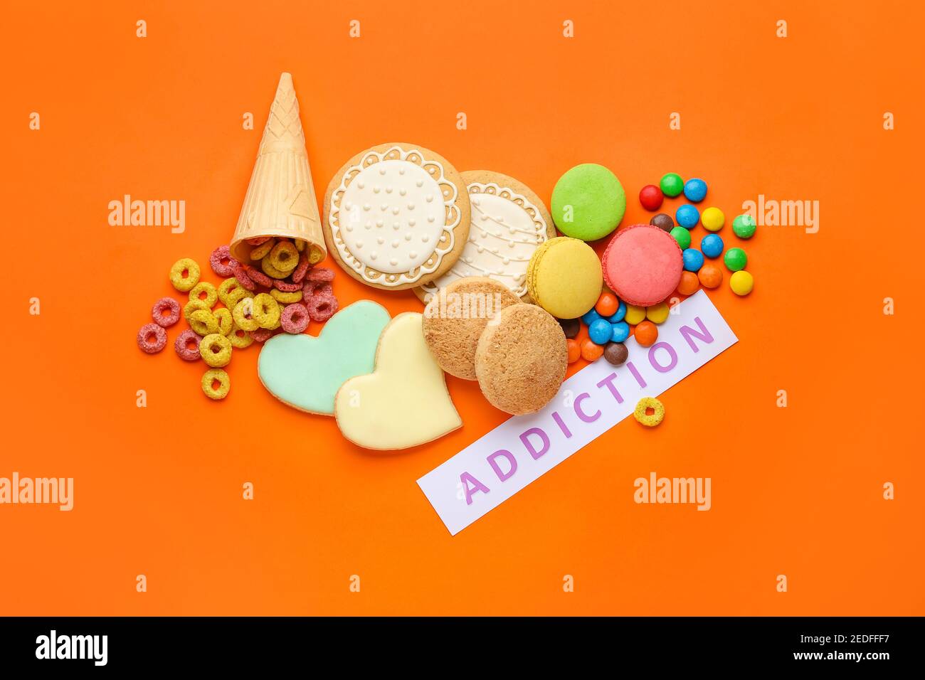 Different sweets on color background. Concept of addiction Stock Photo ...