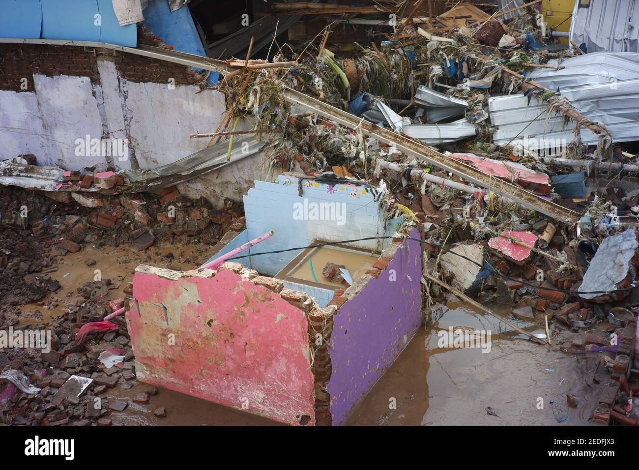 flash floods that destroyed dozens of houses and caused casualties ...