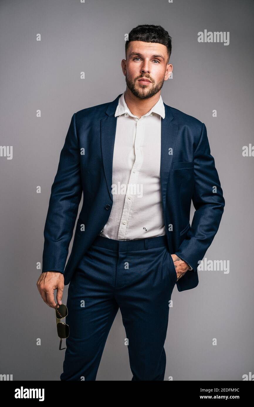 Handsome man serious suit hi-res stock photography and images - Alamy