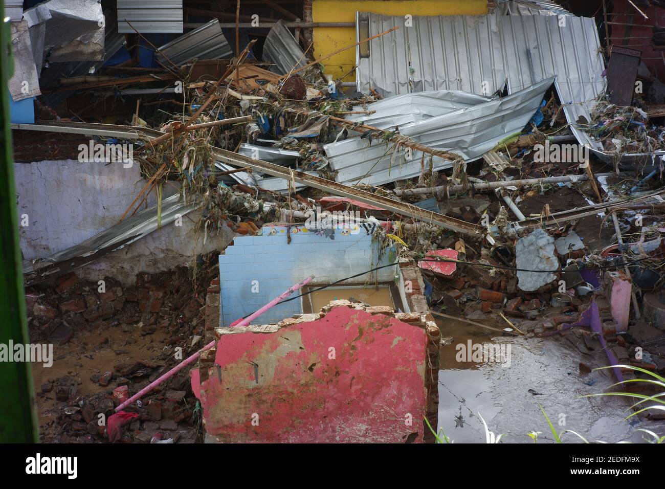 flash floods that destroyed dozens of houses and caused casualties ...