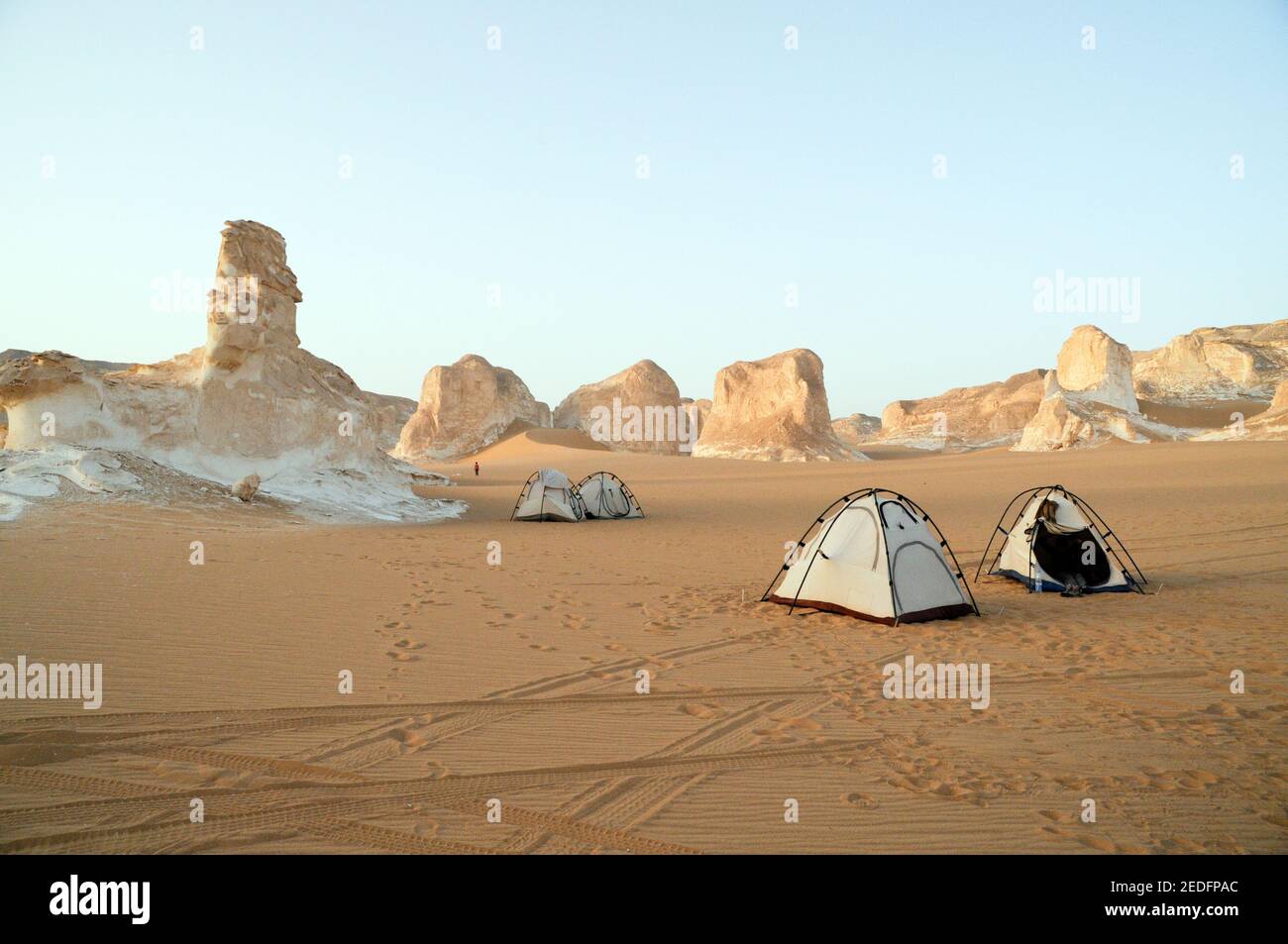 A desert safari camp in amid white rock formations and inselbergs in ...
