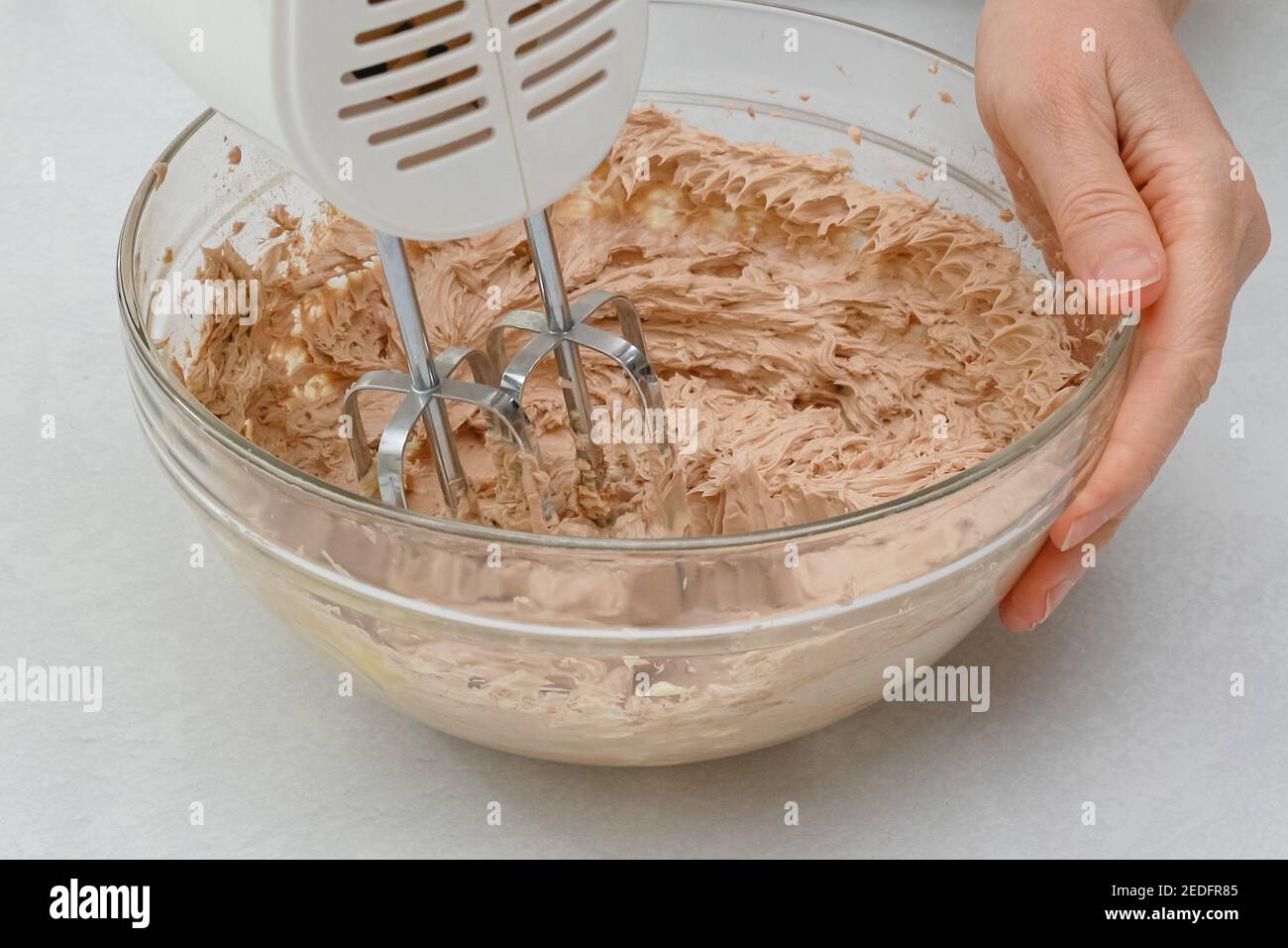Baking cake in process mixing hi-res stock photography and images - Alamy