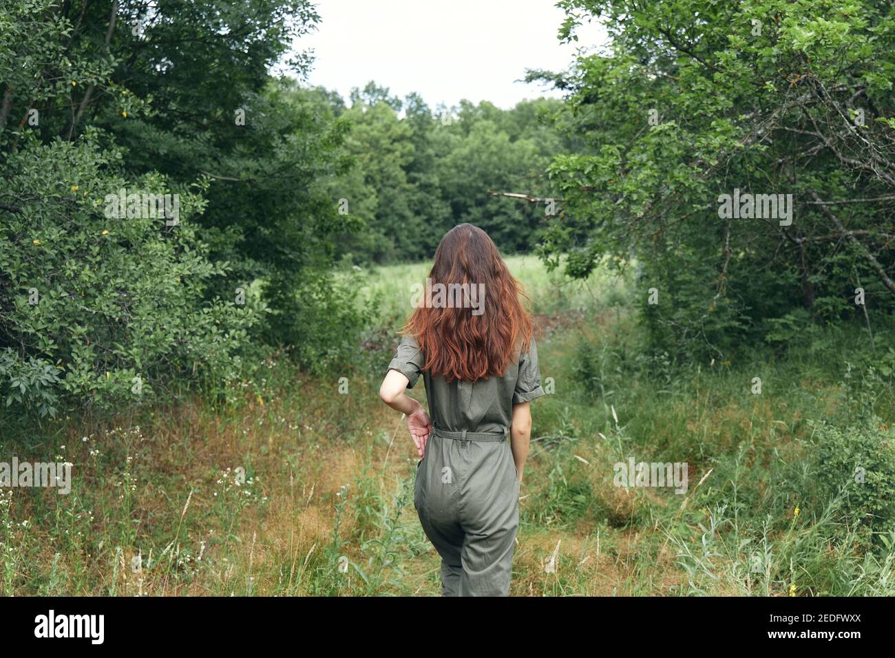 Person in overalls rear view hi-res stock photography and images - Alamy