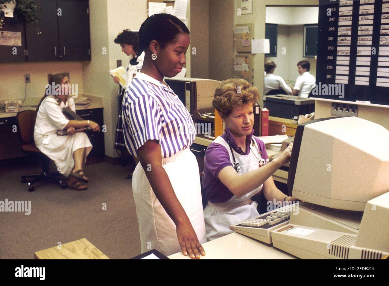 Nurses in a nurses' station, USA 1987 Stock Photo - Alamy
