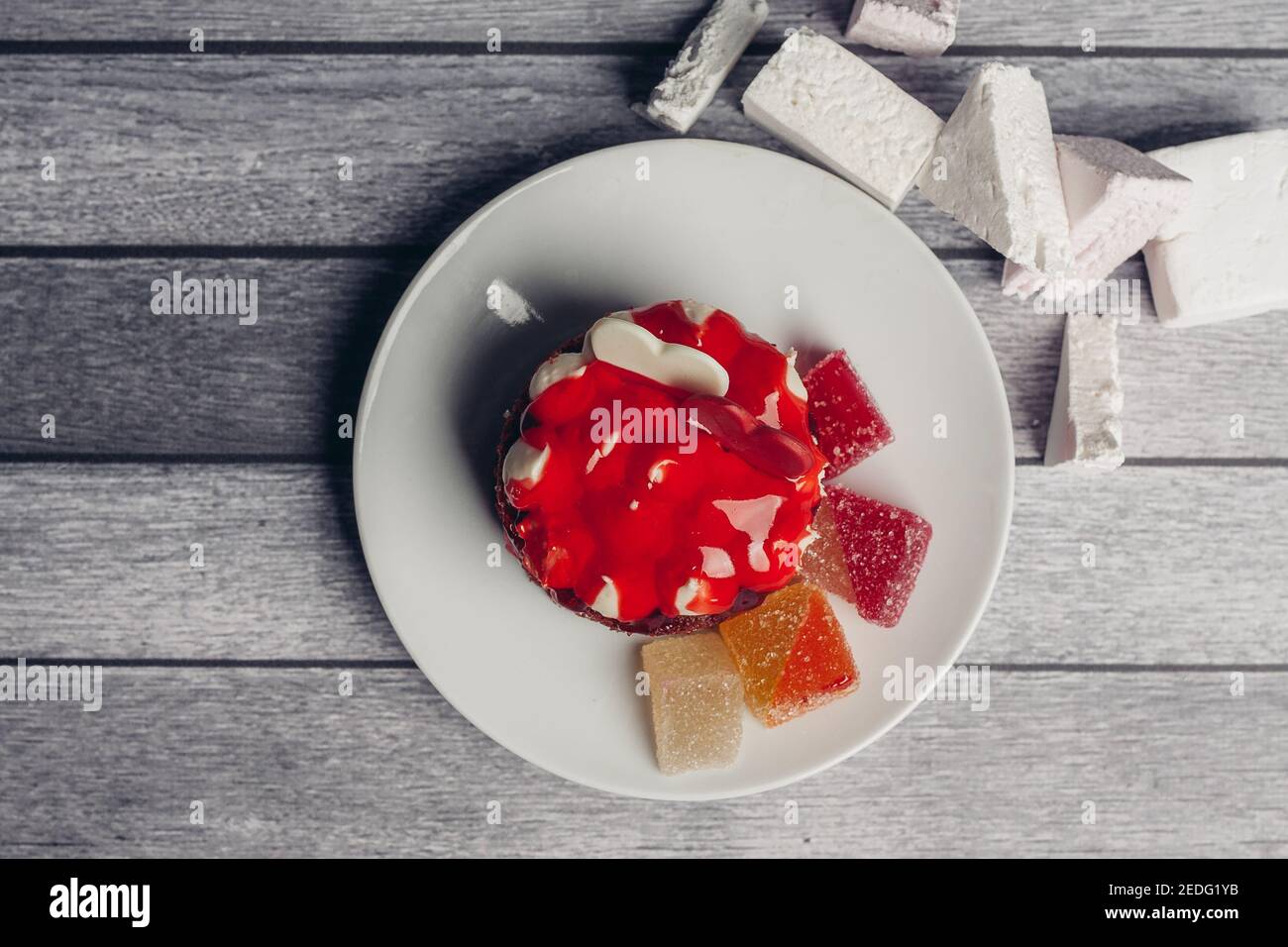 red cake on the table dessert sweets top view enjoyment Stock Photo - Alamy