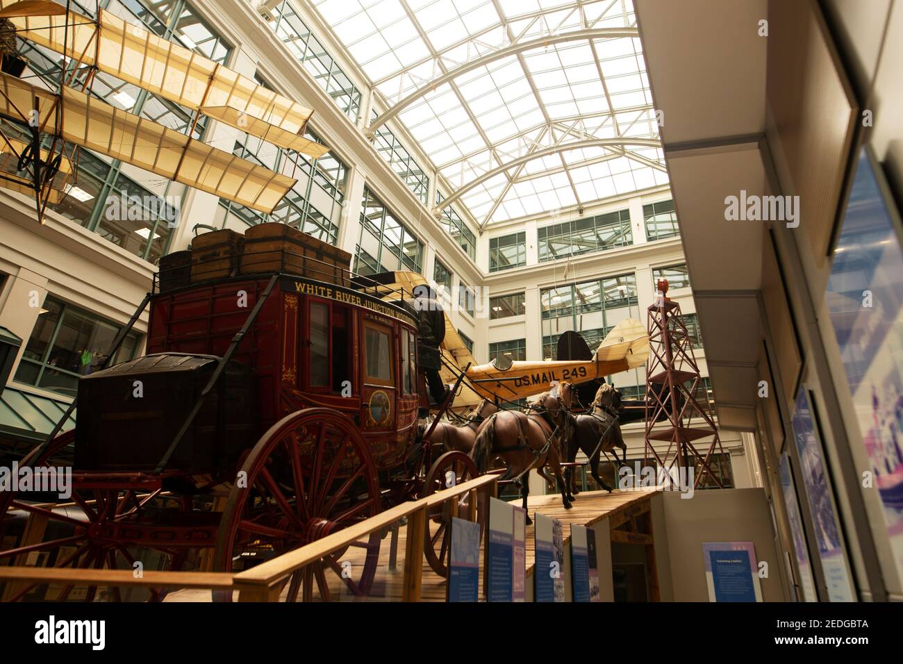 A historic mail carriage and airplane on display at the Smithsonian ...
