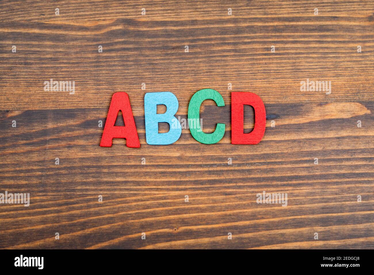 ABCD, education and science concept. Colorful letters of the wooden ...