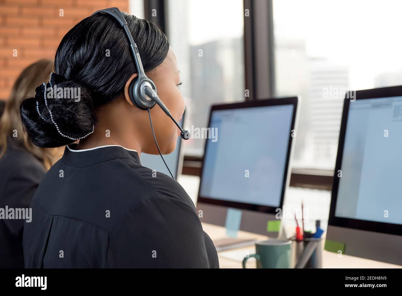 Call center worker black hi-res stock photography and images - Alamy