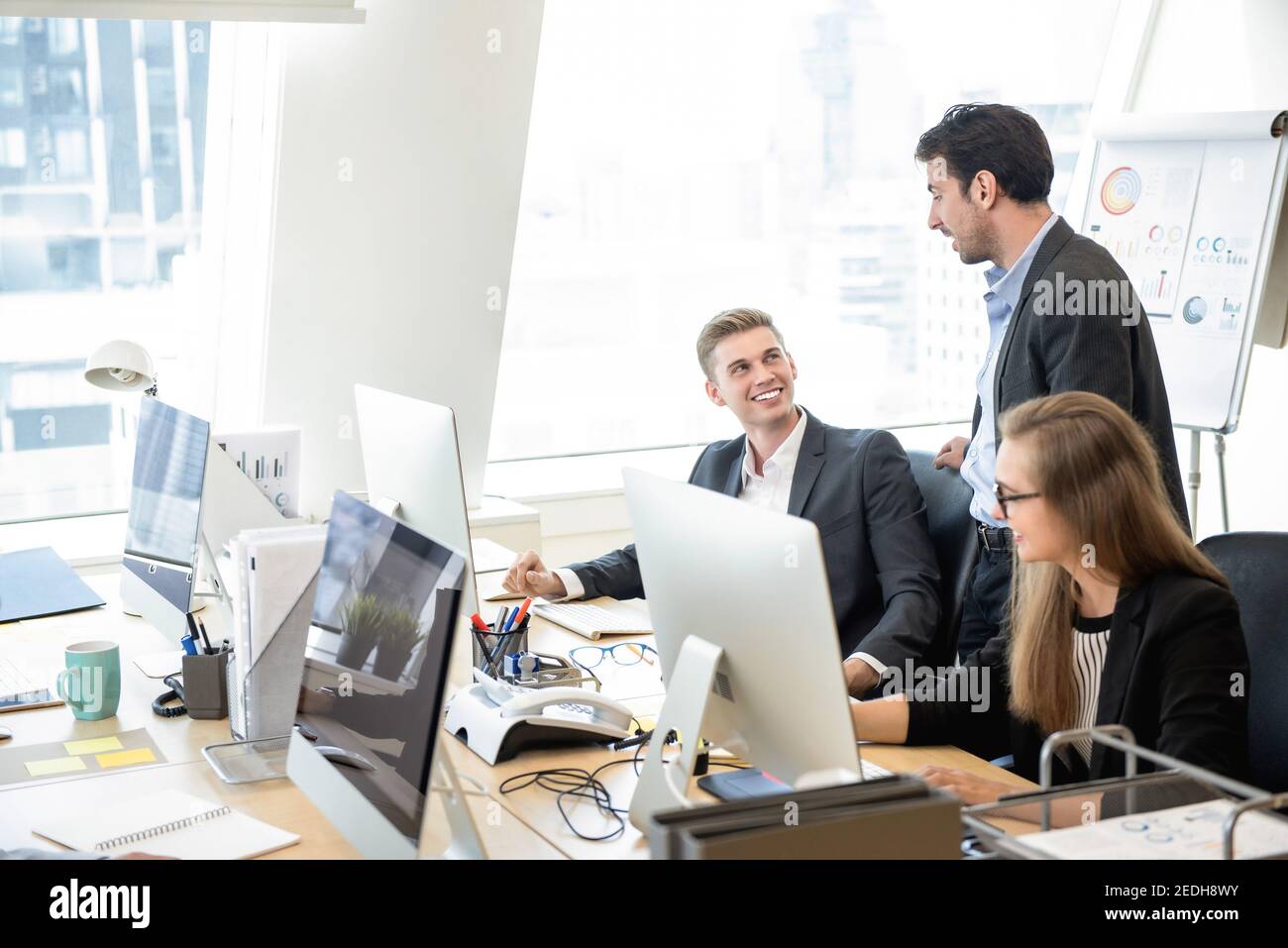 Businessman supervisor talking with team in headquarters office on high ...