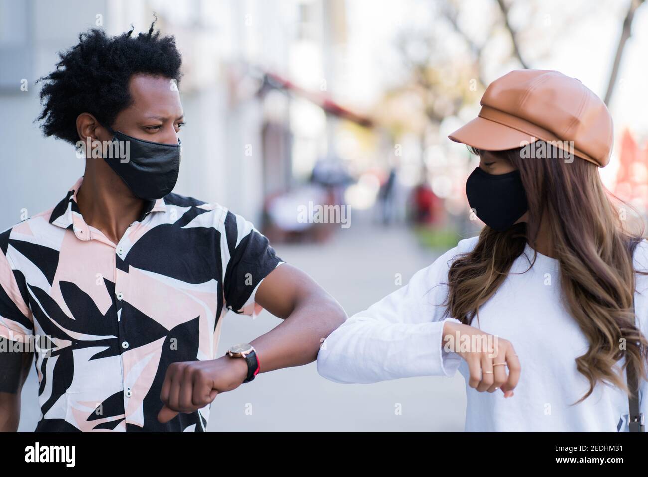 Couple greeting elbows elbows hi-res stock photography and images - Alamy