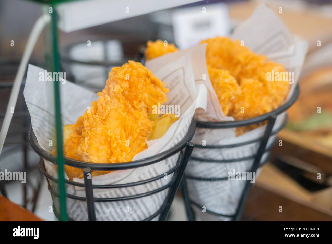 Fish wrapped in newspaper hi-res stock photography and images - Alamy