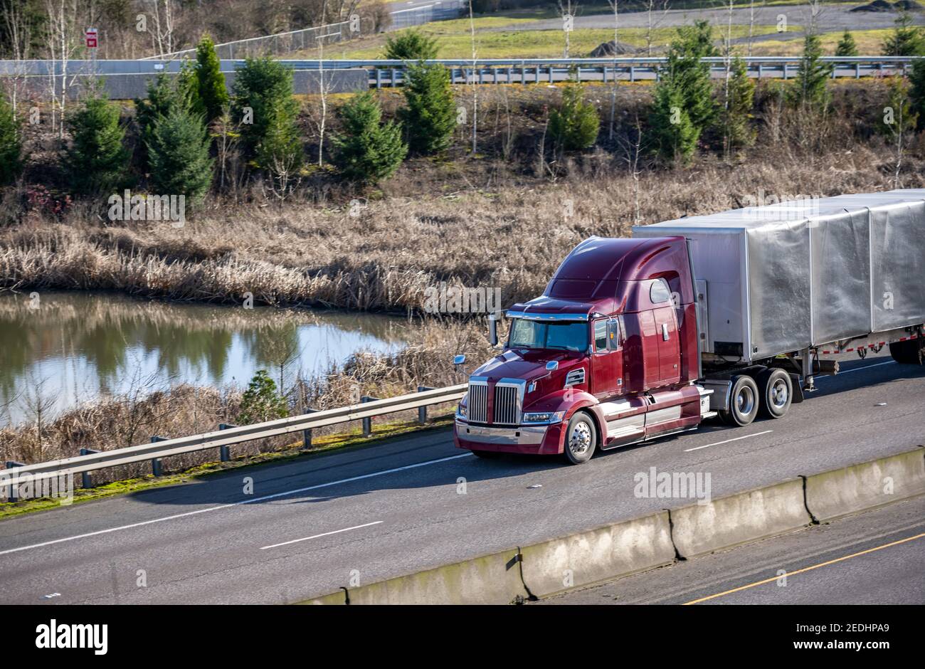 Classic big rig burgundy semi truck tractor with sleeping compartment ...