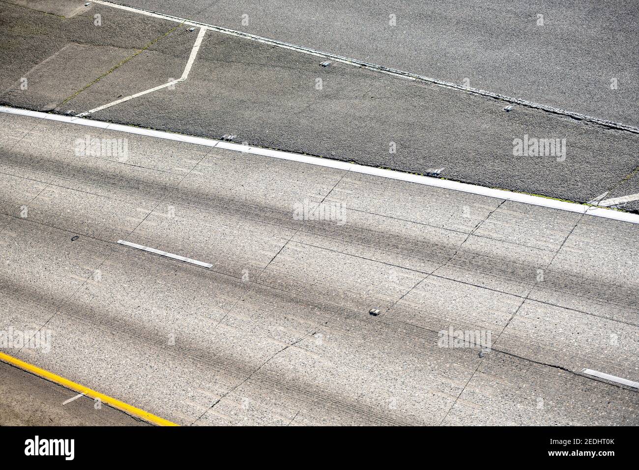 The working surface of a concrete road with a fork and color road ...
