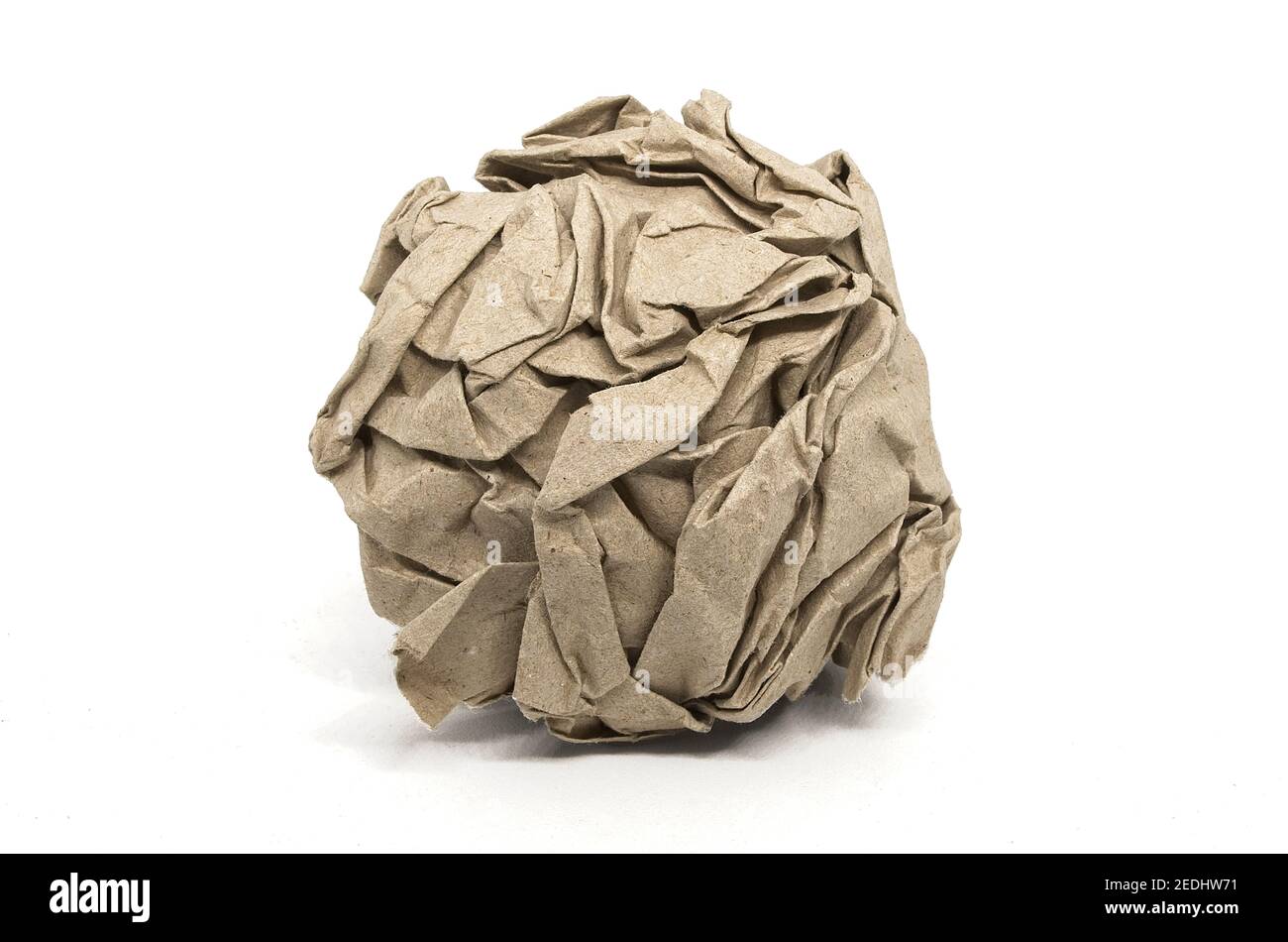 Crumpled piece of recycled paper on white background. Green waste Stock ...