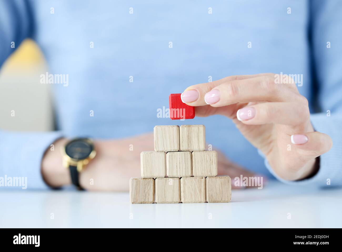 Hand building pyramid hi-res stock photography and images - Alamy
