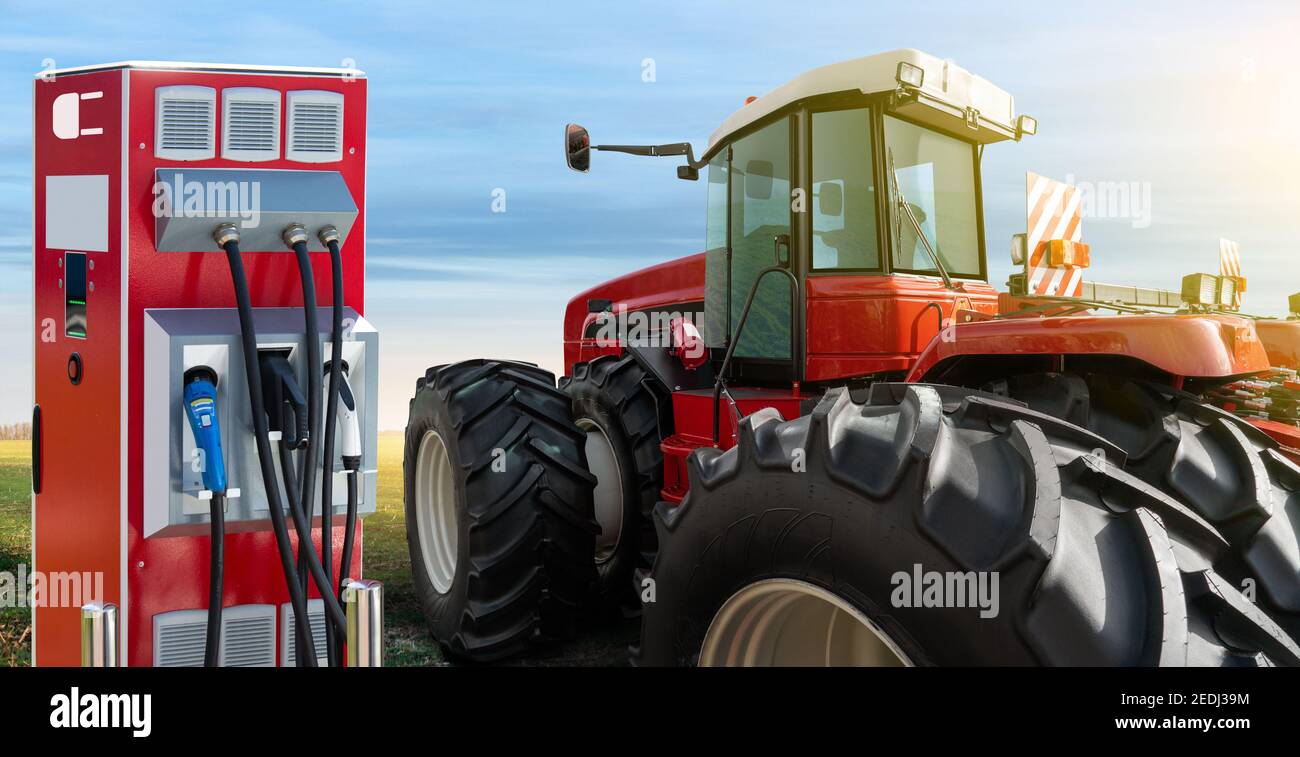 Electric vehicles charging station on a background of agricultural ...