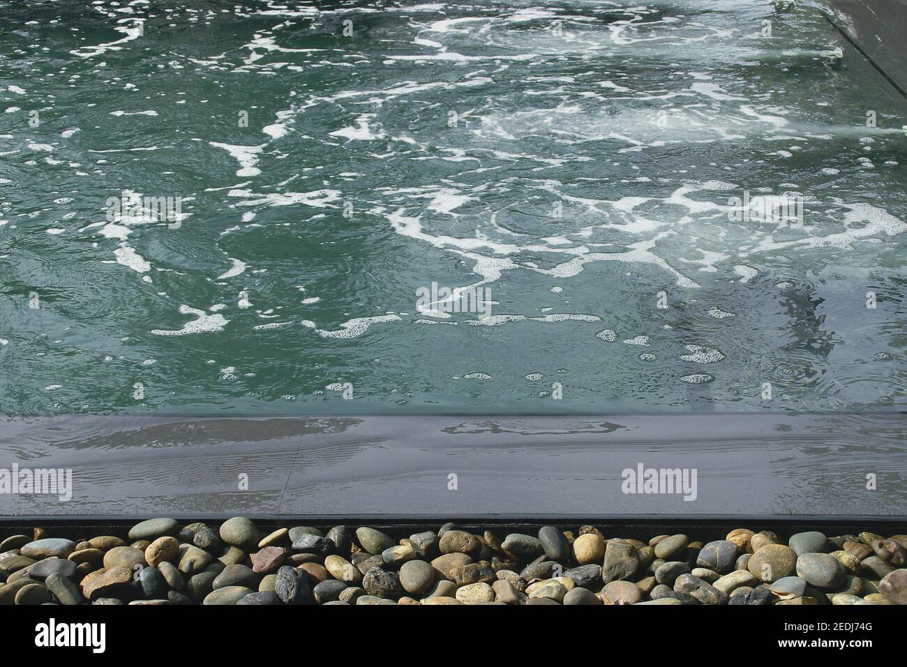 Swimming Pool Water Surface with Massage Air Bubbles Stock Photo - Alamy