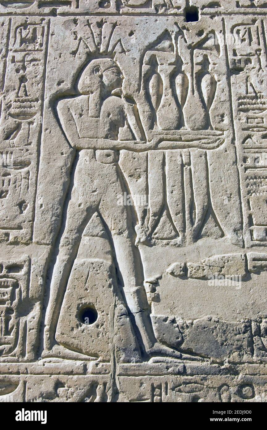 Stone carving of the Ancient Egyptian god of the River Nile Hapi. Shown ...
