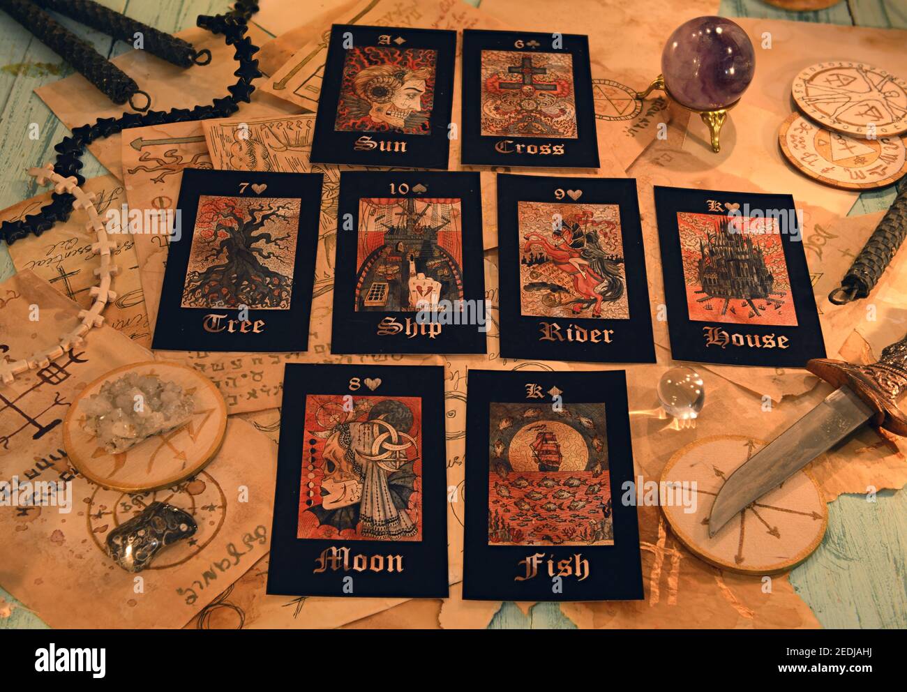 Witch table with tarot cards and magic ritual objects. Esoteric, gothic ...